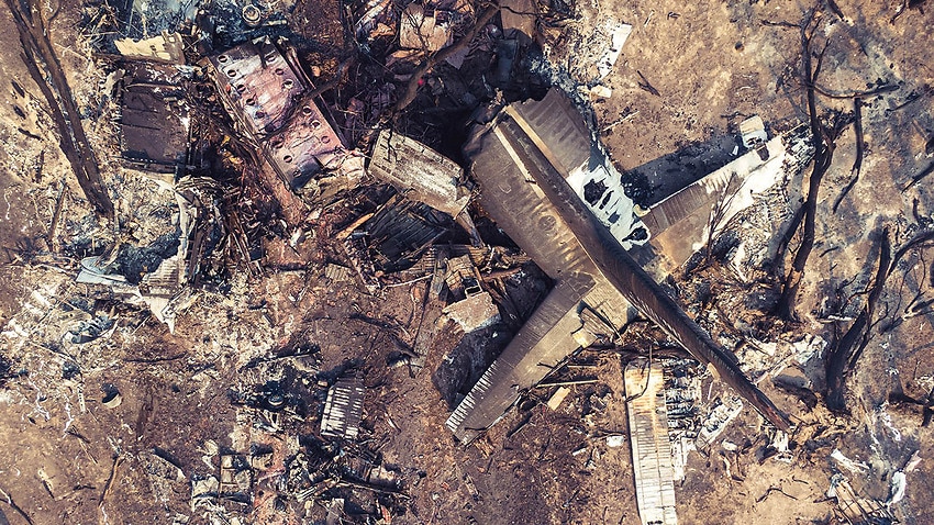 Confronting images of crashed firefighting C-130 emerge as ...